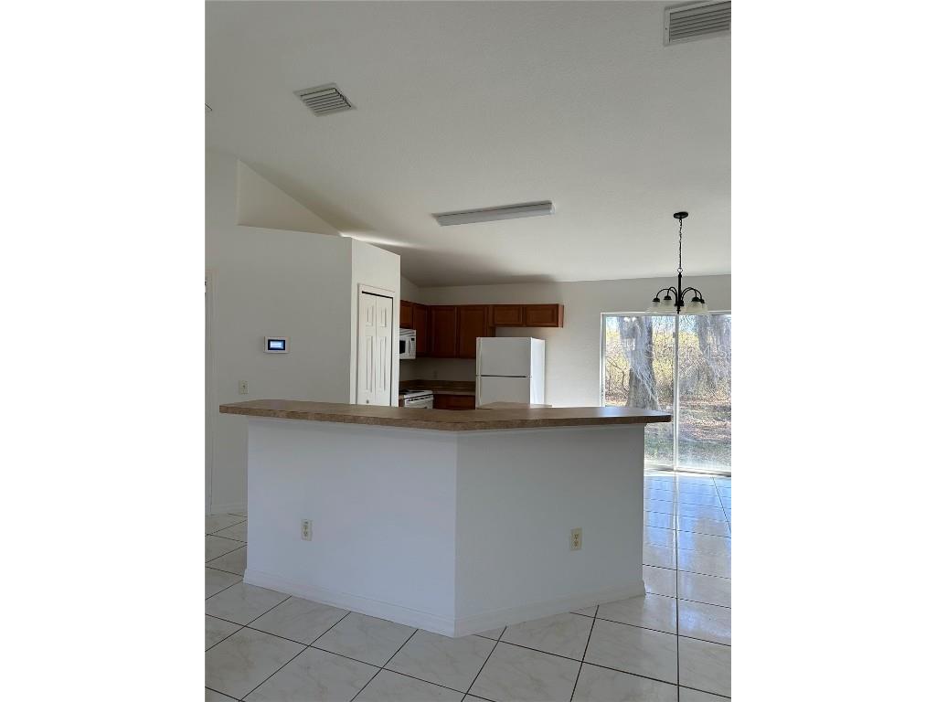 12659 SE 104th Terrace, Belleview, FL, 34420 | MLS: OM680196 | Edina Realty