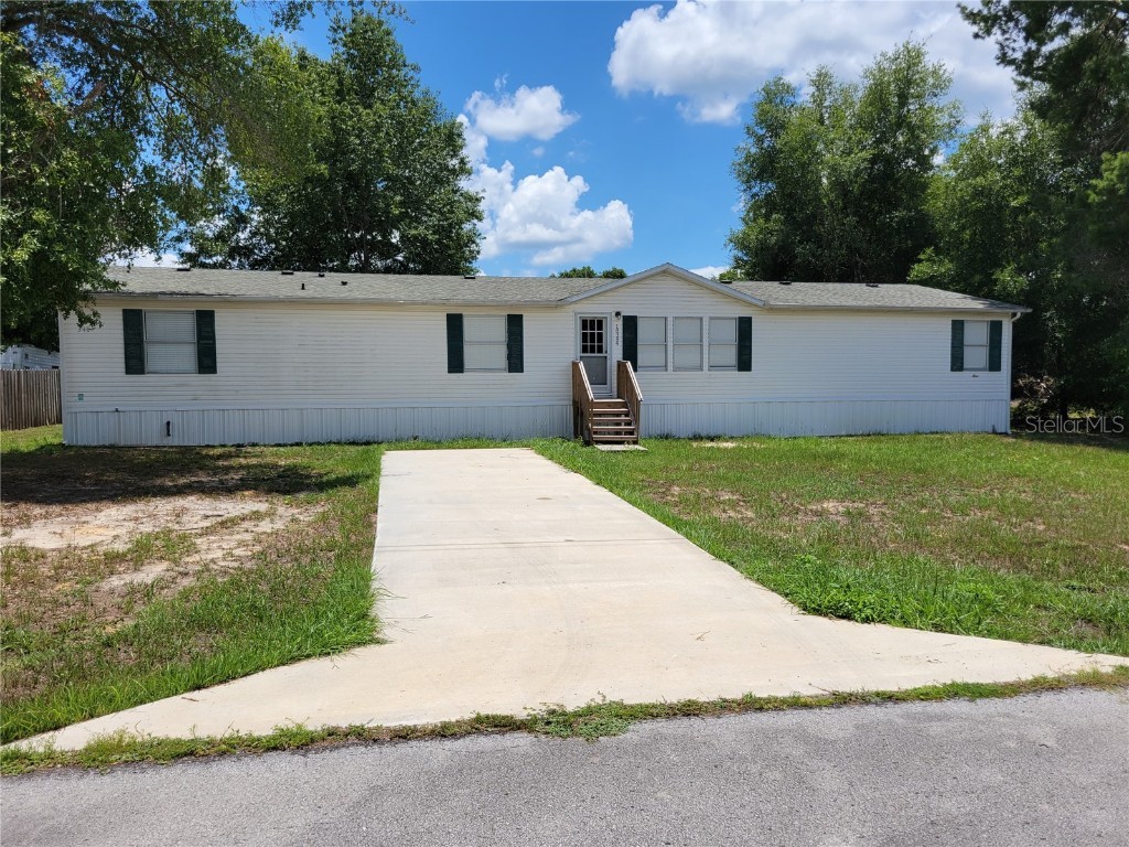 18384 SE 54th Street, Ocklawaha, FL, 32179 | MLS: OM681080 | Edina Realty