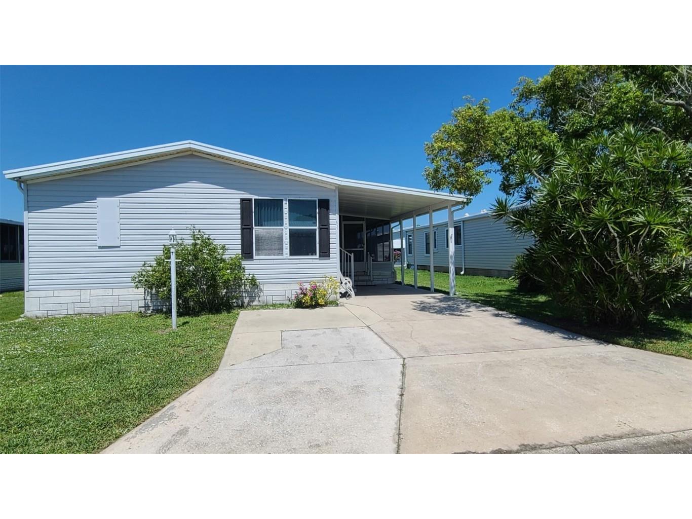 517 Sapote Drive, Barefoot Bay, FL, 32976 | MLS: O6121606 | Edina Realty